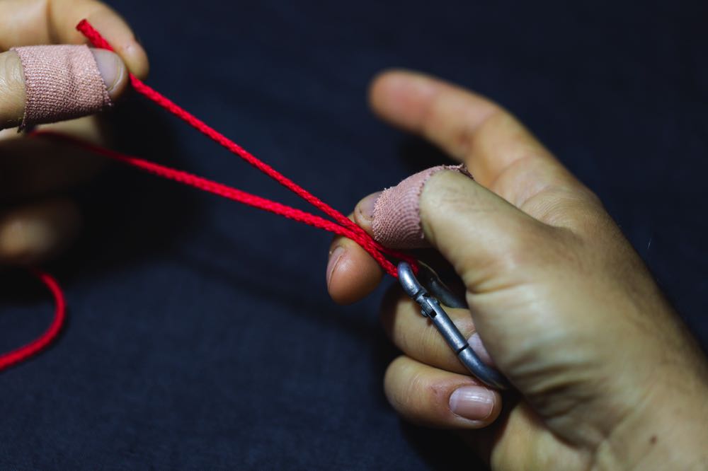How to Tie a Clinch Knot (Step-By-Step With Video) - Into Fly Fishing
